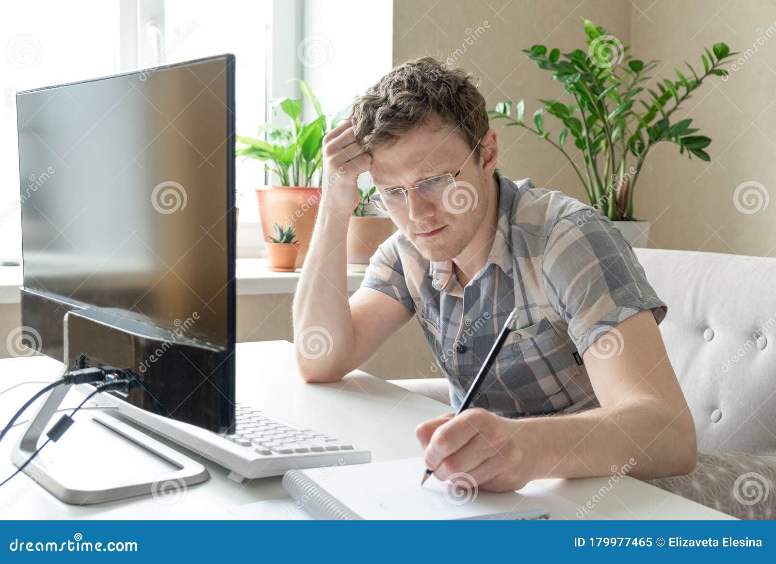 Programmer Working from Home, Remote, Home Office. a Man with Glasses ...