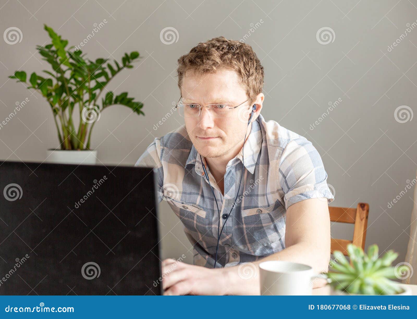 Programmer Working from Home, Remote, Home Office. a Man with Glasses ...