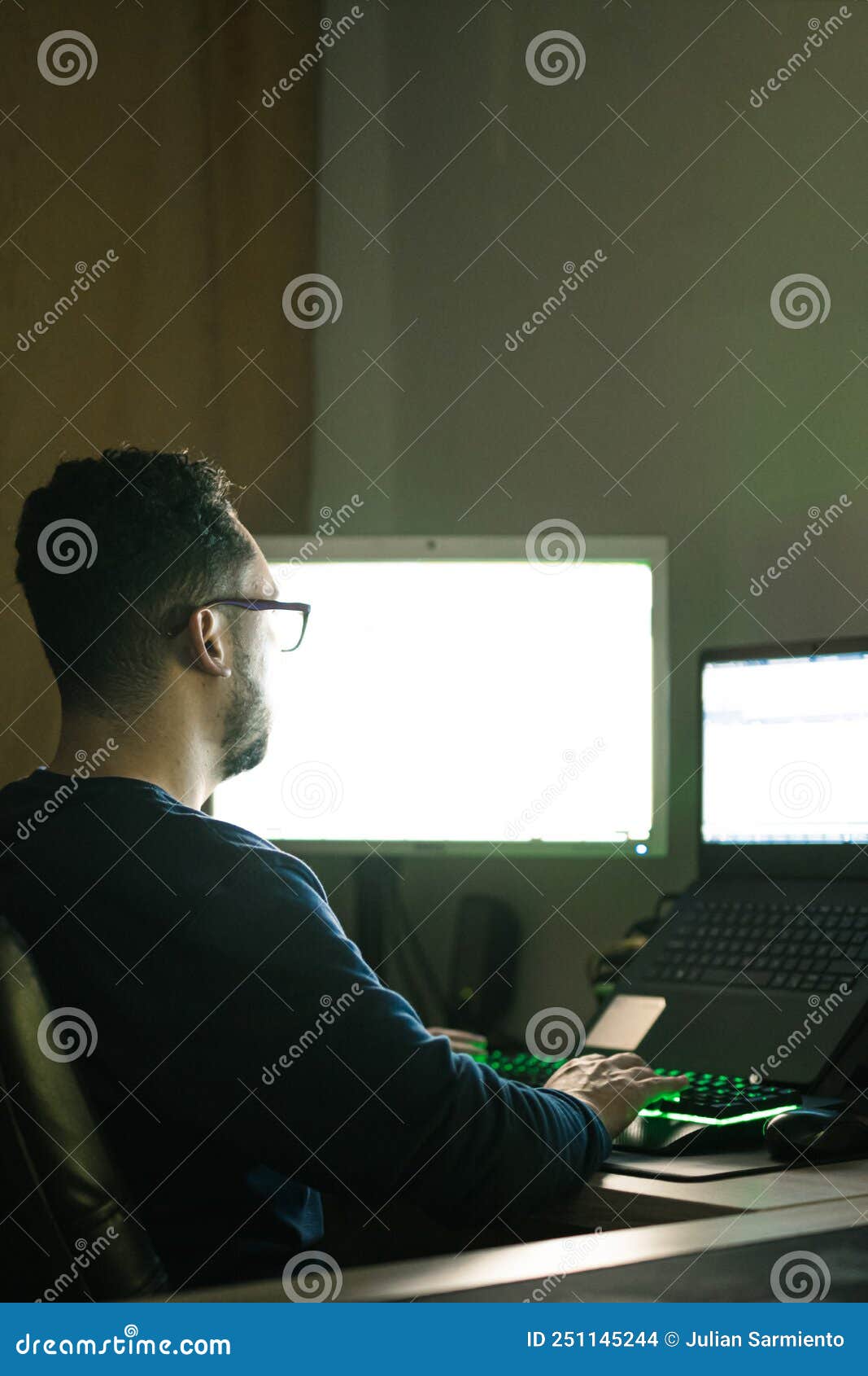 Programmer Working Remotely from Home and Developing Web Pages at Night ...