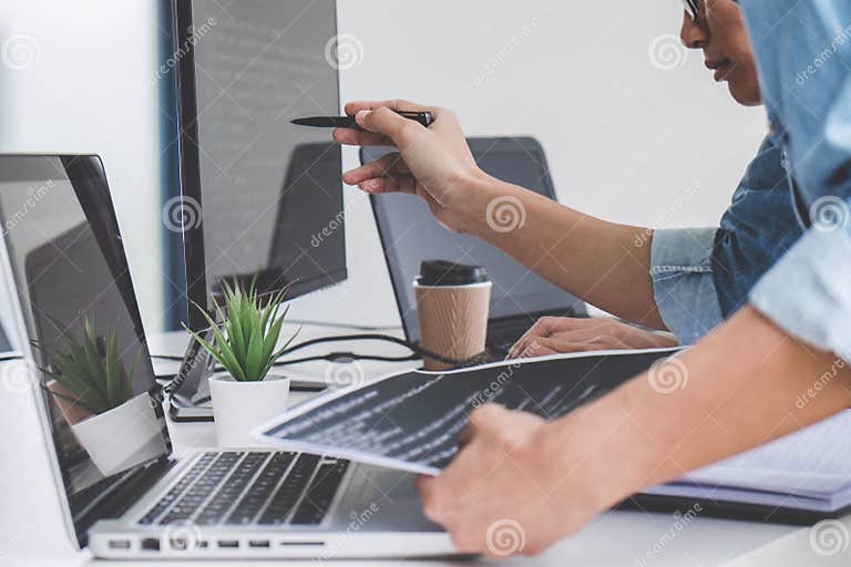 Programmers Cooperating at Developing Programming and Website Working ...