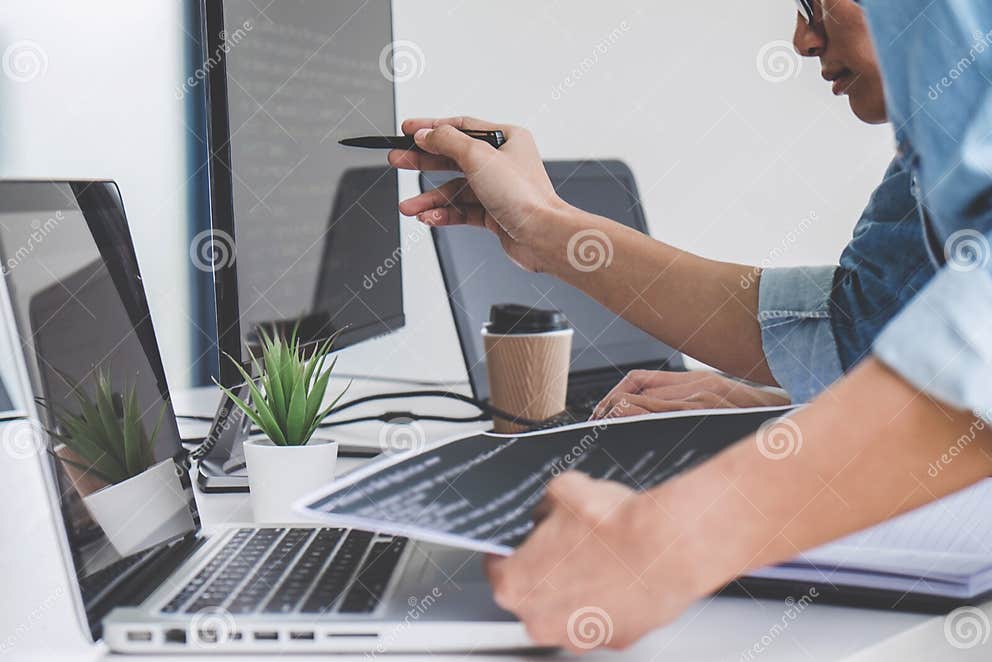 Programmers Cooperating at Developing Programming and Website Working ...