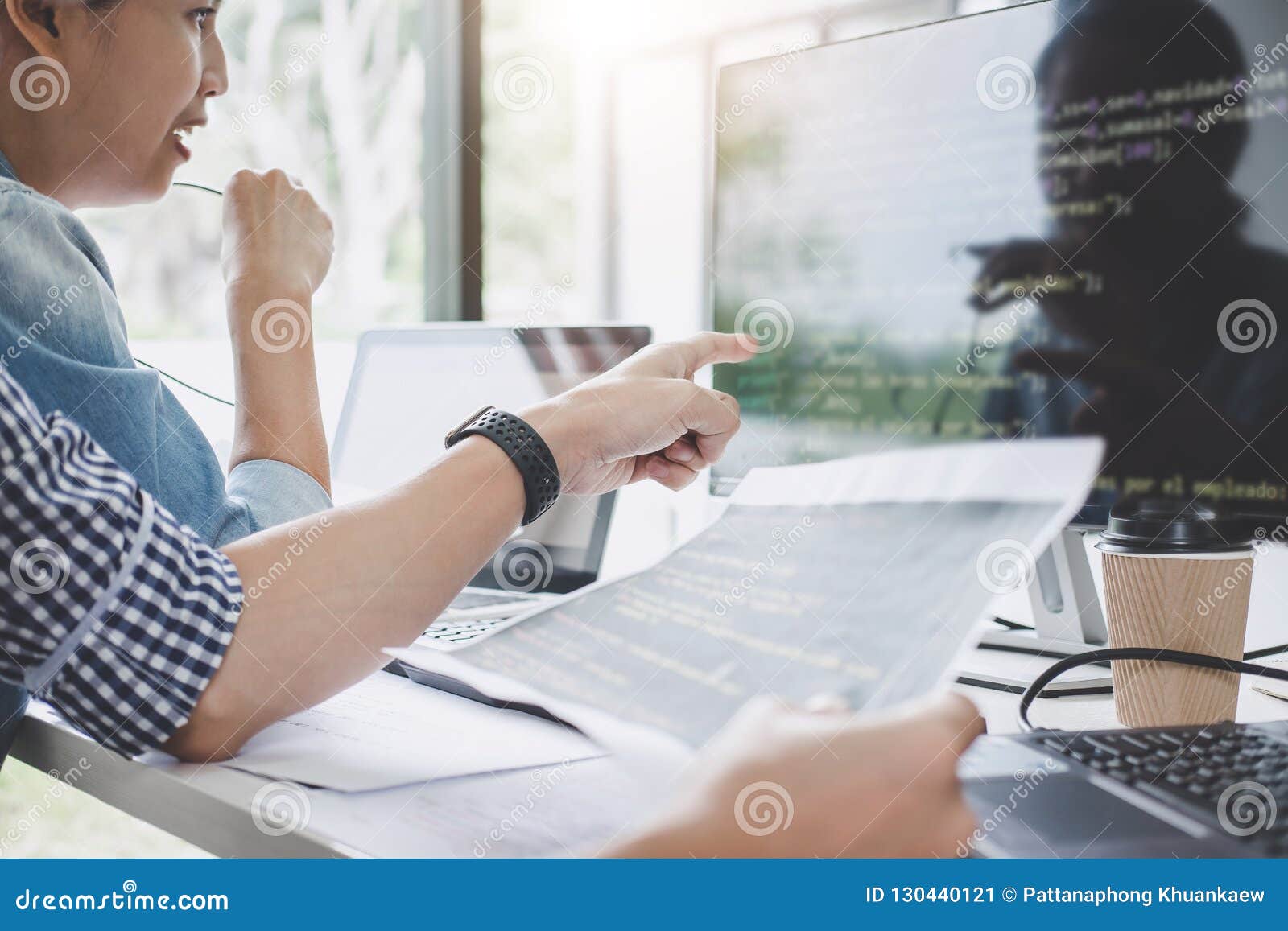 Programmers Cooperating at Developing Programming and Website Working in a Software Develop ...