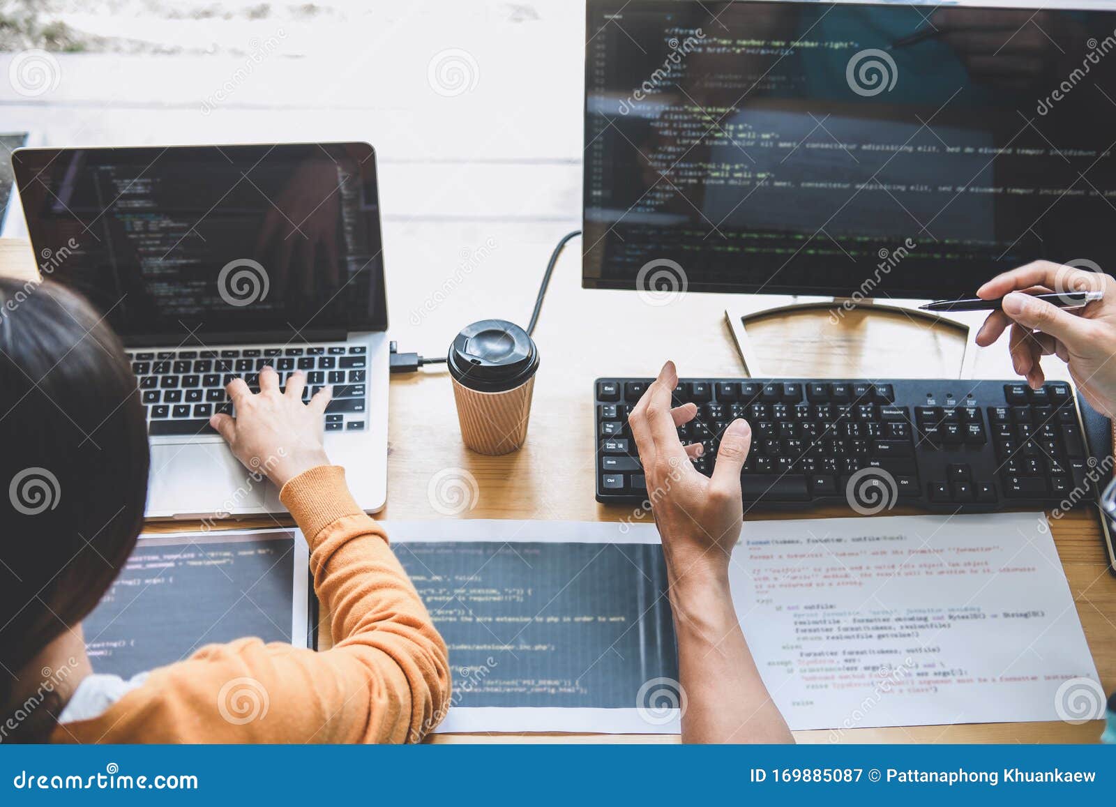 Programmers Cooperating At Developing Programming And Website Working In A Software Develop