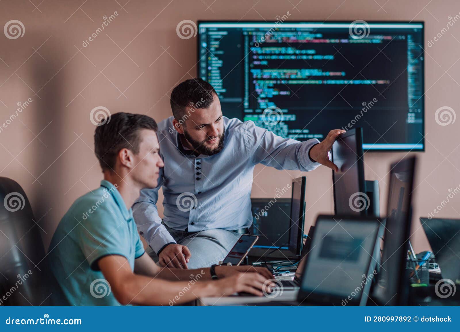 Programmers Engrossed in Deep Collaboration, Diligently Working ... Programmers Engrossed in Deep Collaboration, Diligently Working ...