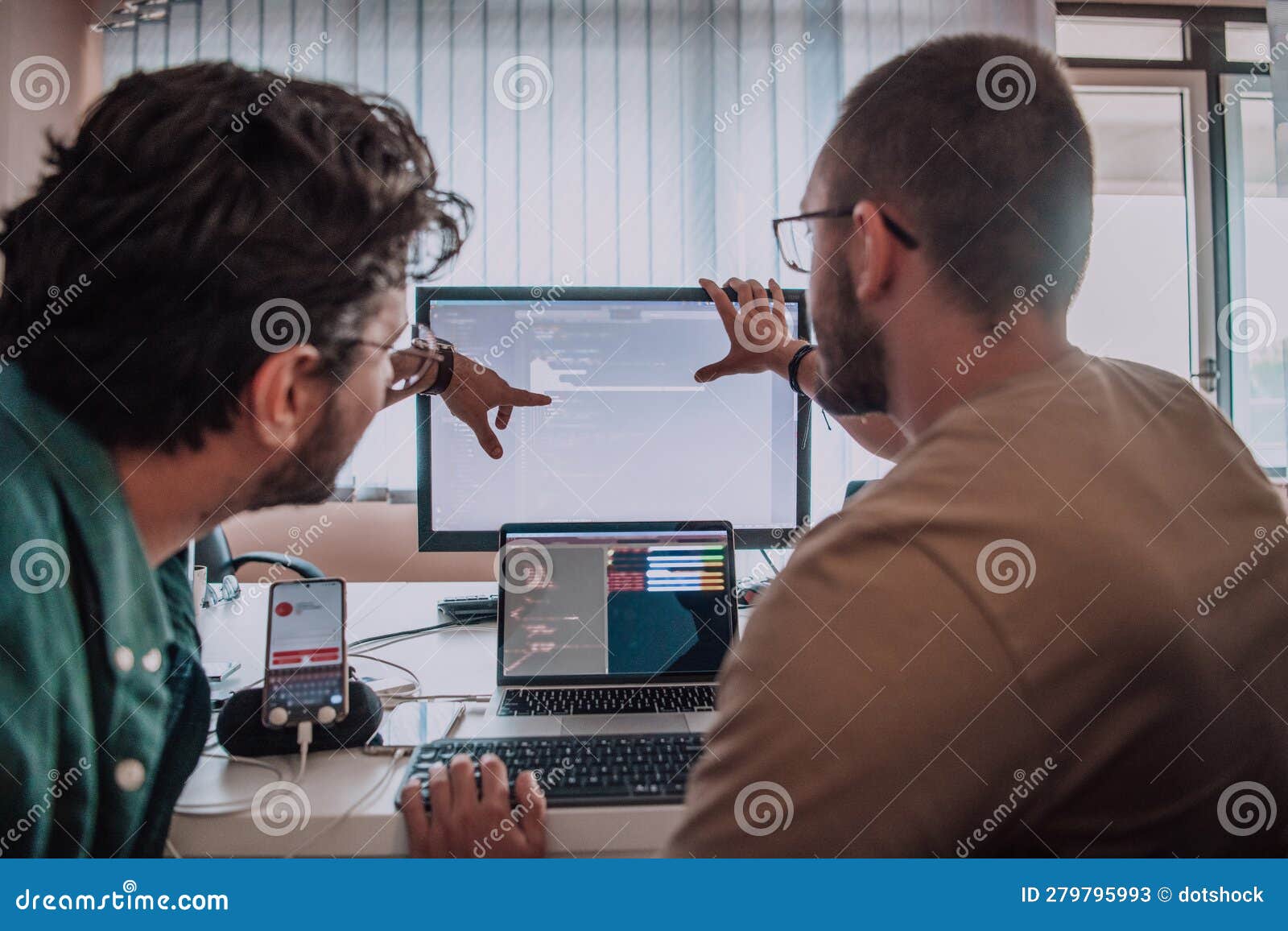 Programmers Engrossed in Deep Collaboration, Diligently Working ... Programmers Engrossed in Deep Collaboration, Diligently Working ...