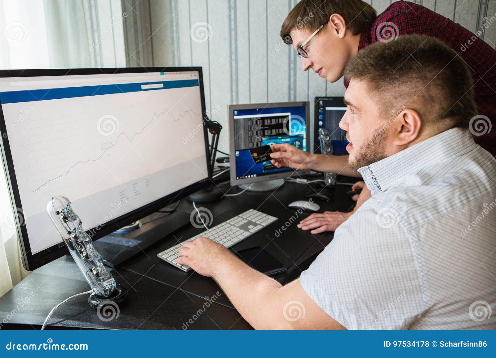 Programmers are Watching the Bitcoin Exchange Rate Stock Photo - Image ...