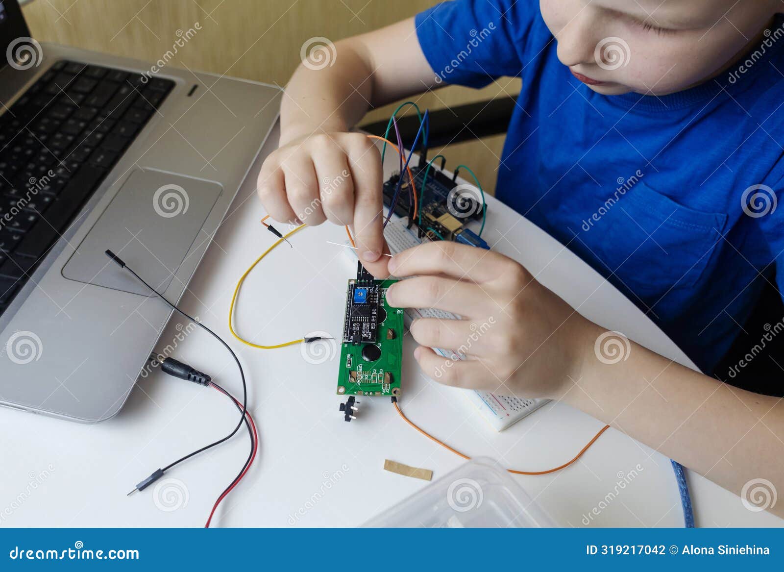 Programming for Children. the Boy is Studying Online at a Robotics ...