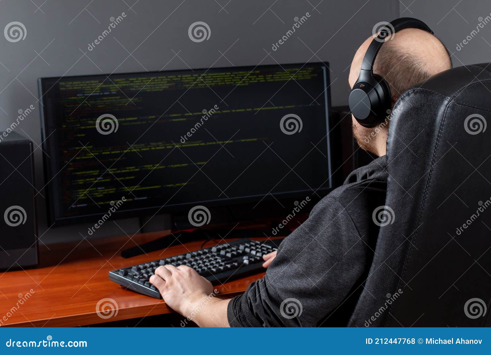 Programming. a Man Working on a Computer in it at Home, Sitting at a ...