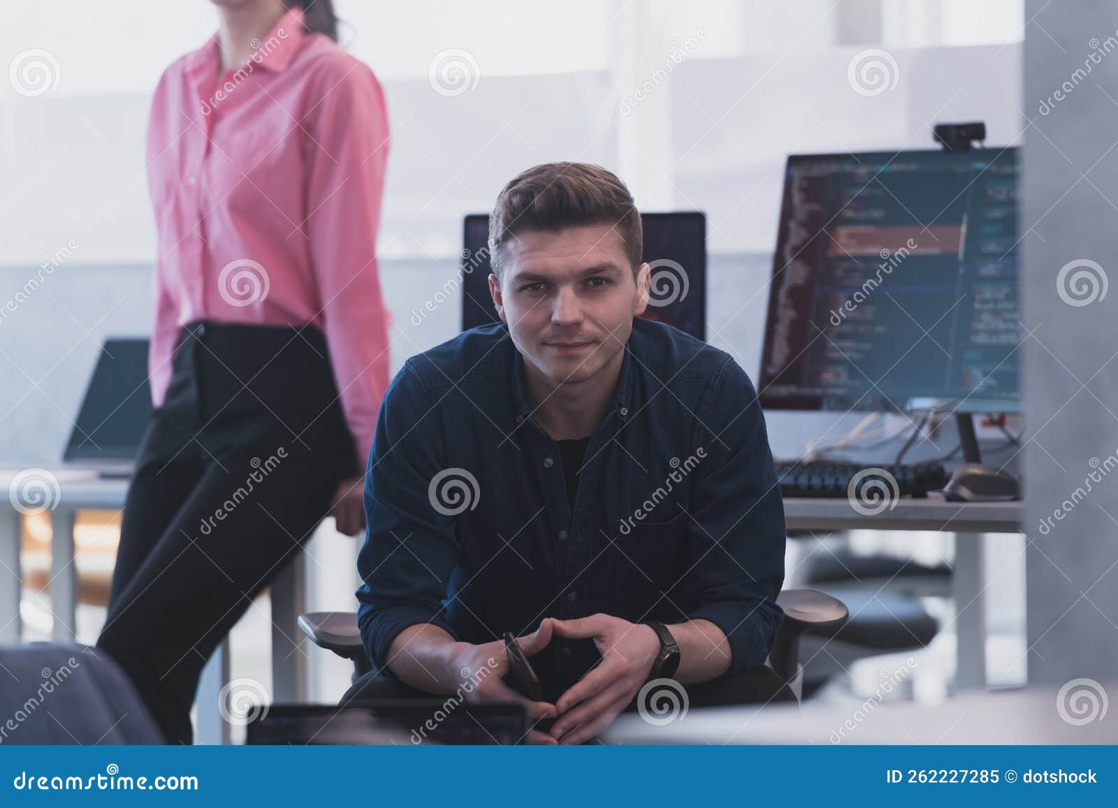 Programming Man Working On Computer In It Office Sitting At Desk Writing Codes Stock Image