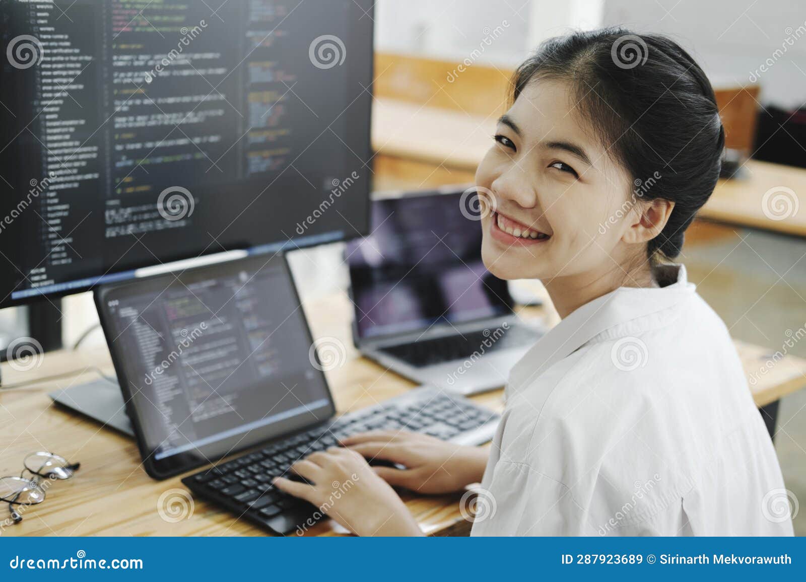 Young Programmer Working on Desktop PC in Office of Software Company. Stock Image - Image of ...