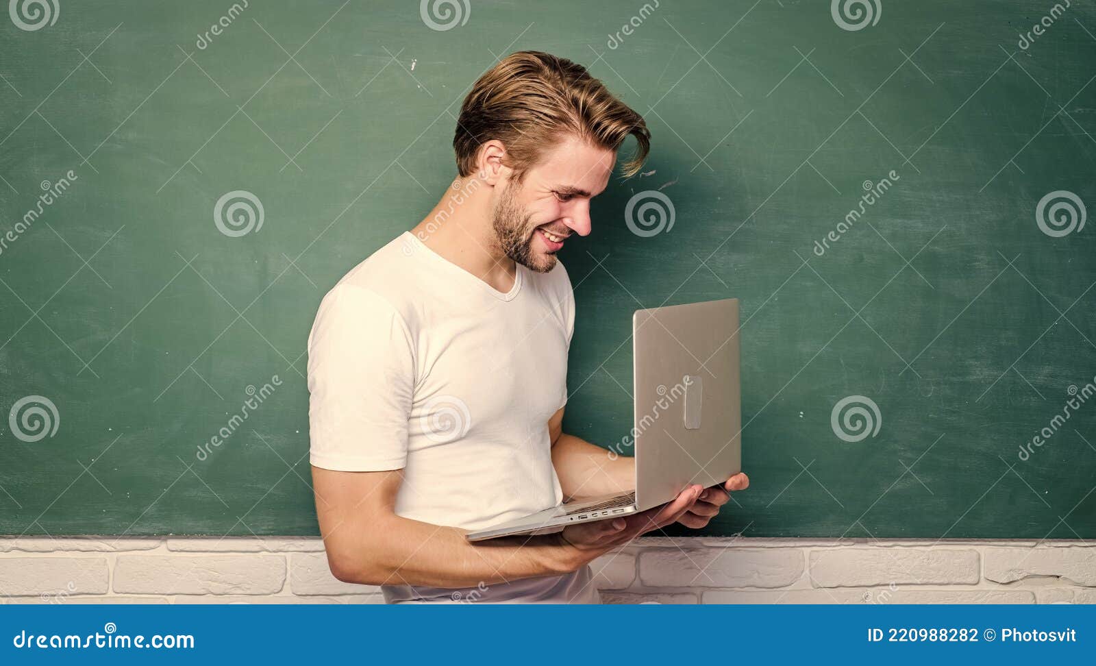 Programming Web Development. School Teacher Programming with Laptop ...