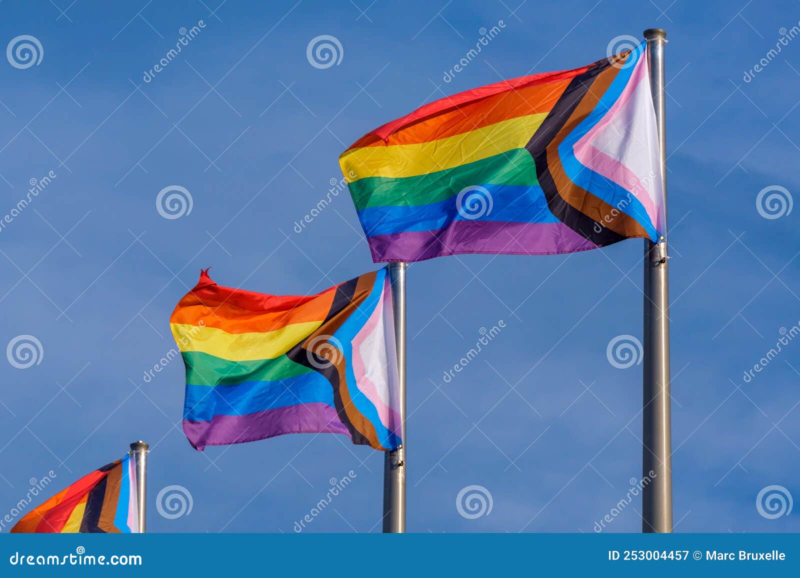 Progress Pride Flags Waving Over Blue Sky Stock Image - Image of ...