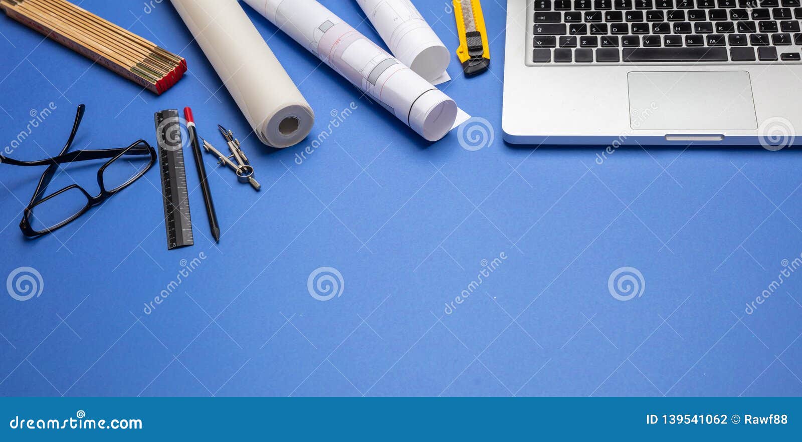 Project Blueprints, Stationery and Computer Laptop on Blue Color Stock ...