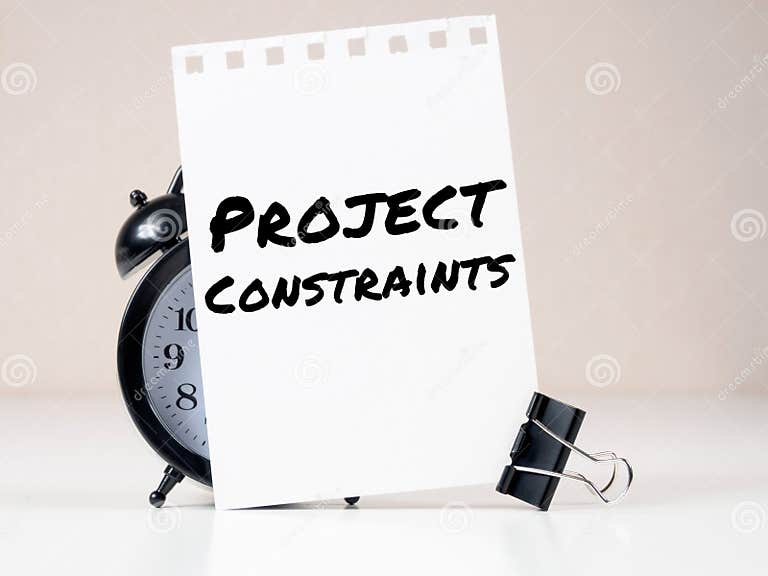 Project Constraints Header on White Note Paper Background Alarm Clock ...