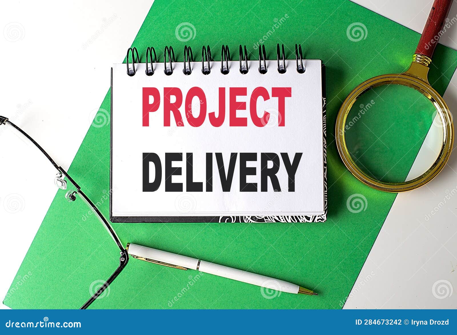 PROJECT DELIVERY Text on Notebook on Green Paper Stock Photo - Image of ...