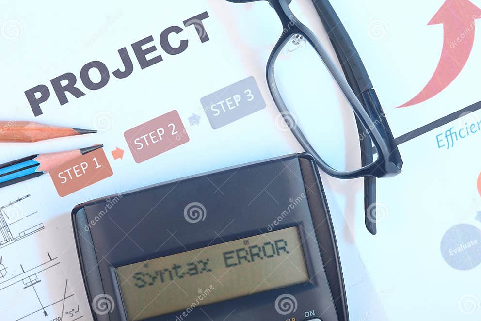 Project Document with Syntax Error Message on Calculator Stock Photo ...