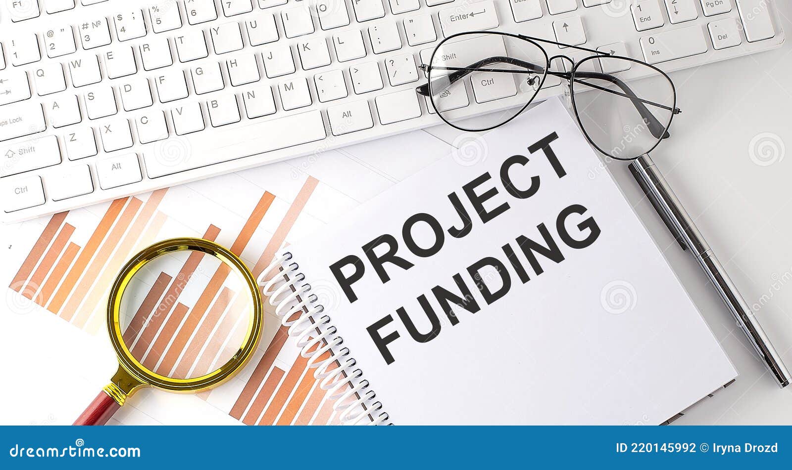 PROJECT FUNDING Text Written on a Notebook with Keyboard, Chart,and ...
