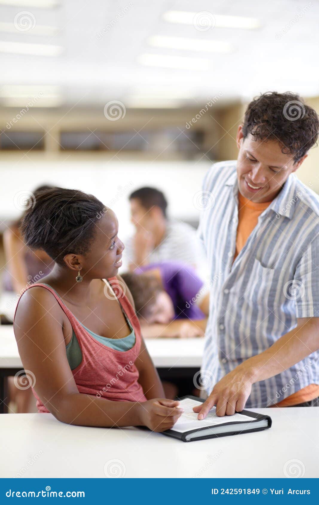 This Project is a Group Effort. Shot of College Students Studying ...