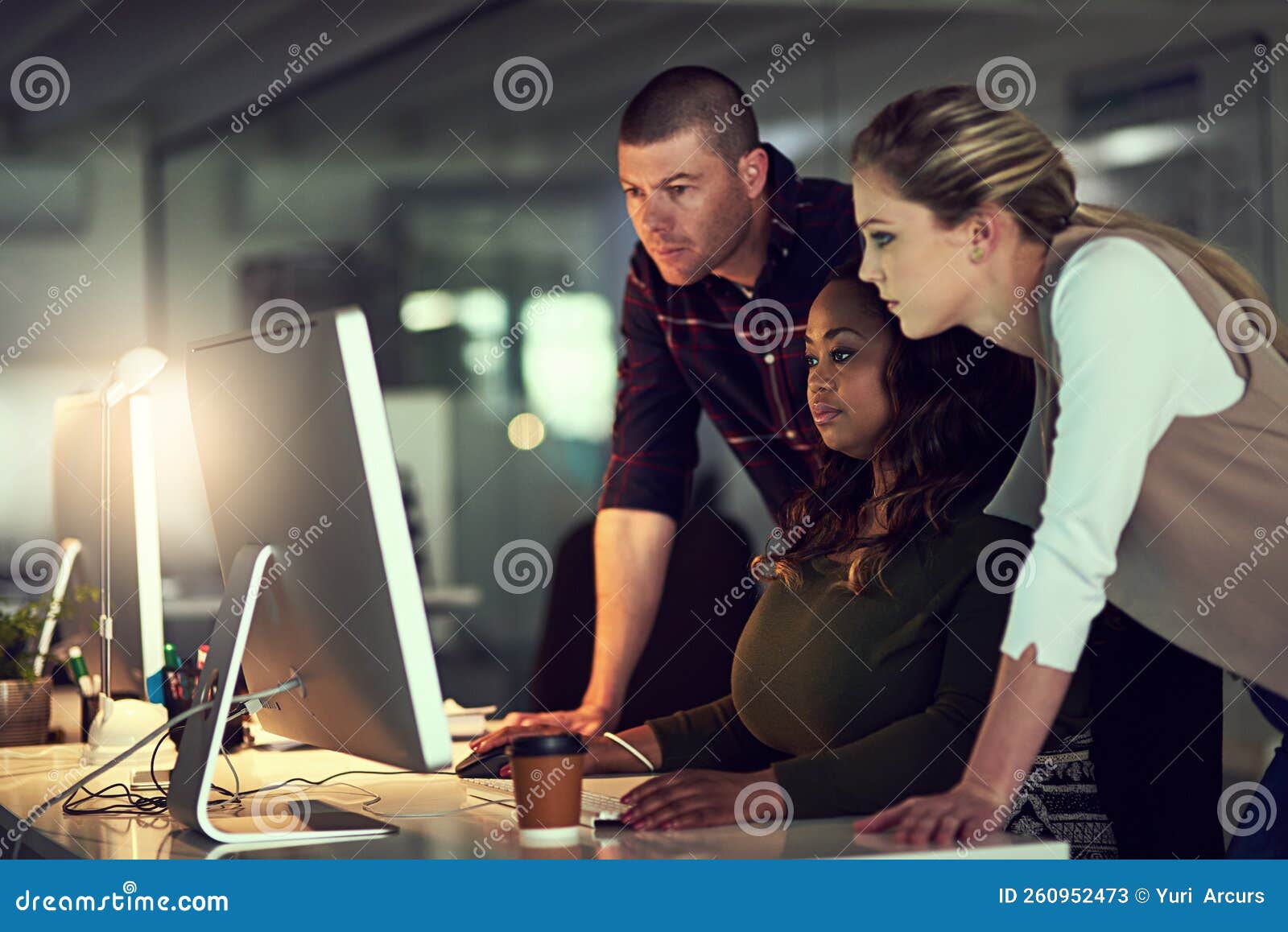 This Project Has Our Full Attention. a Group of Work Colleagues Working ...