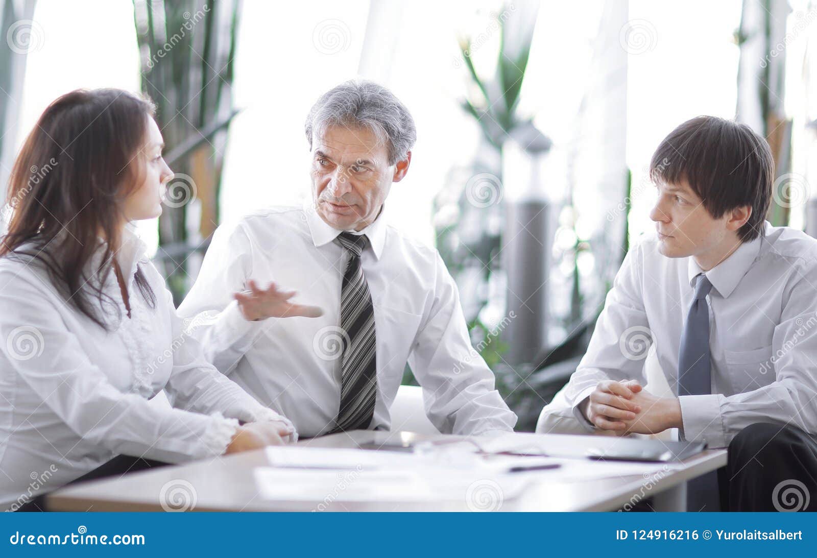 Project Leader Talking To Business Team in the Workplace. Stock Photo ... Project Leader Talking To Business Team in the Workplace. Stock Photo ...