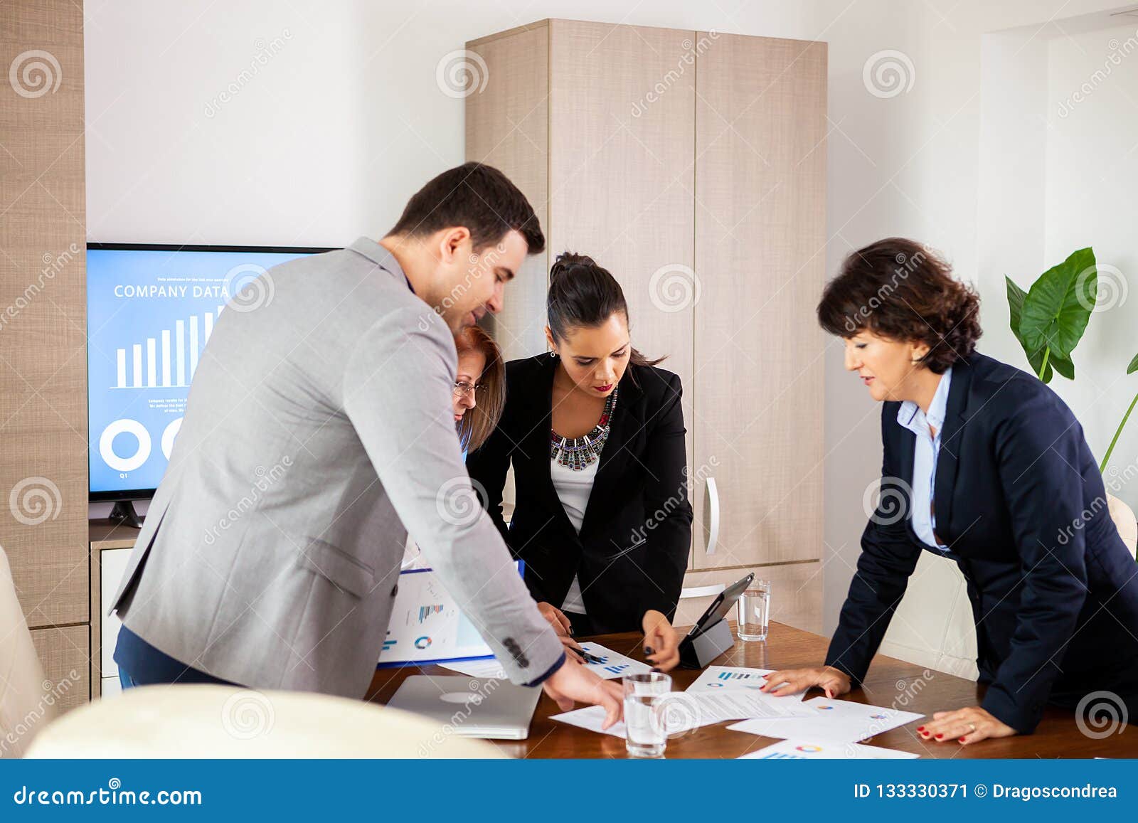 Project Manager Congratulating Work Superintendent with Successful ...