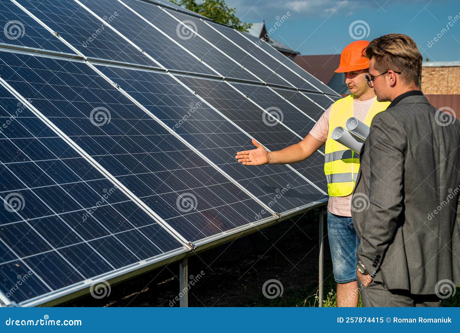 Project Manager Discuss with Worker Installation Process Near Solar ...