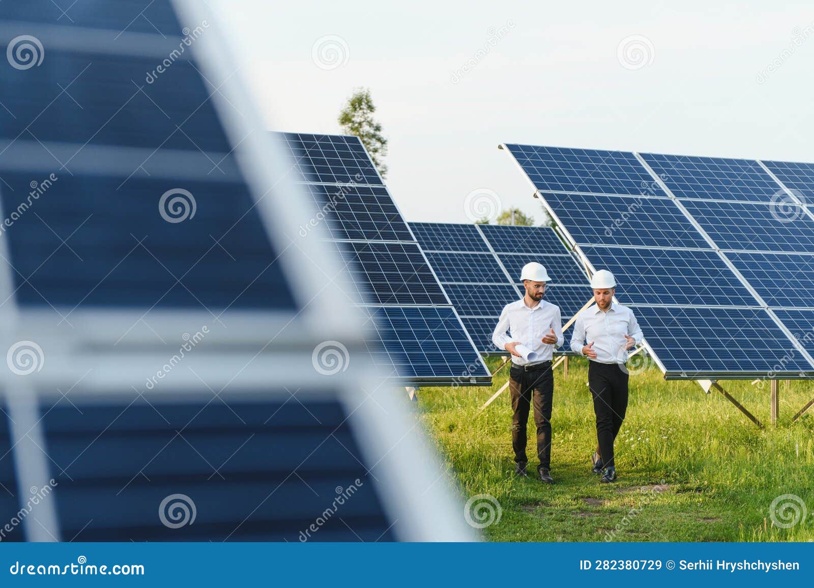 Project Manager Discuss with Worker Installation Process of Solar Panel ...