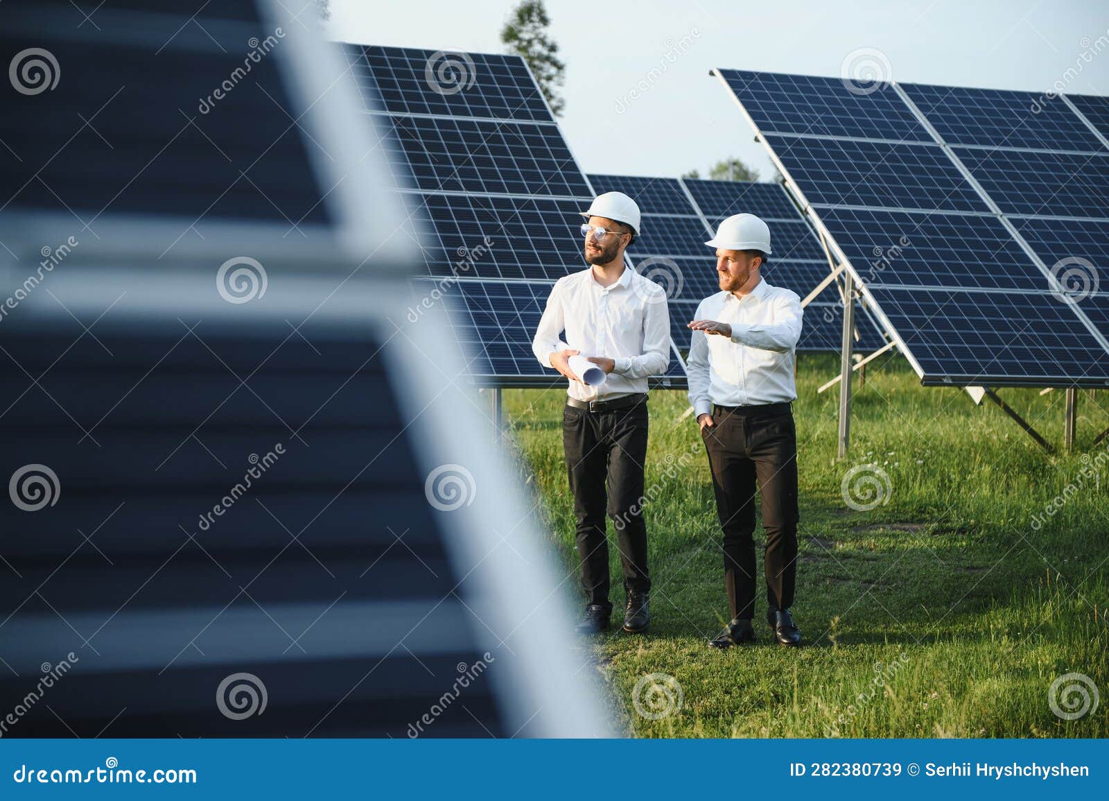 Project Manager Discuss with Worker Installation Process of Solar Panel ...