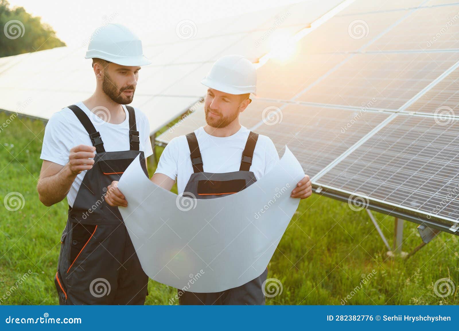 Project Manager Discuss with Worker Installation Process of Solar Panel ...