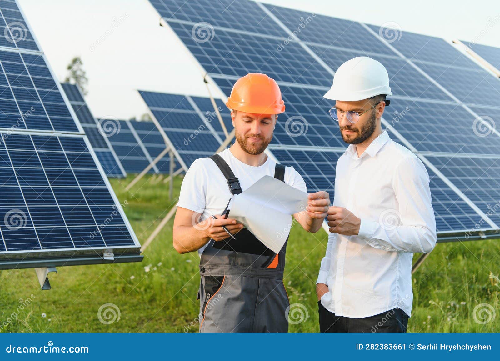 Project Manager Discuss with Worker Installation Process of Solar Panel ...