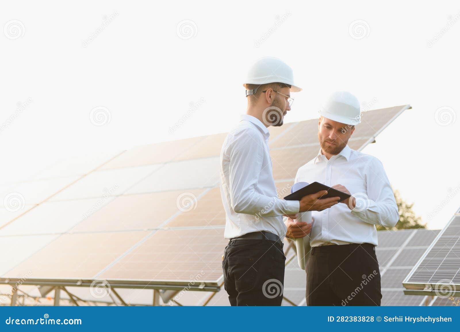 Project Manager Discuss with Worker Installation Process of Solar Panel ...