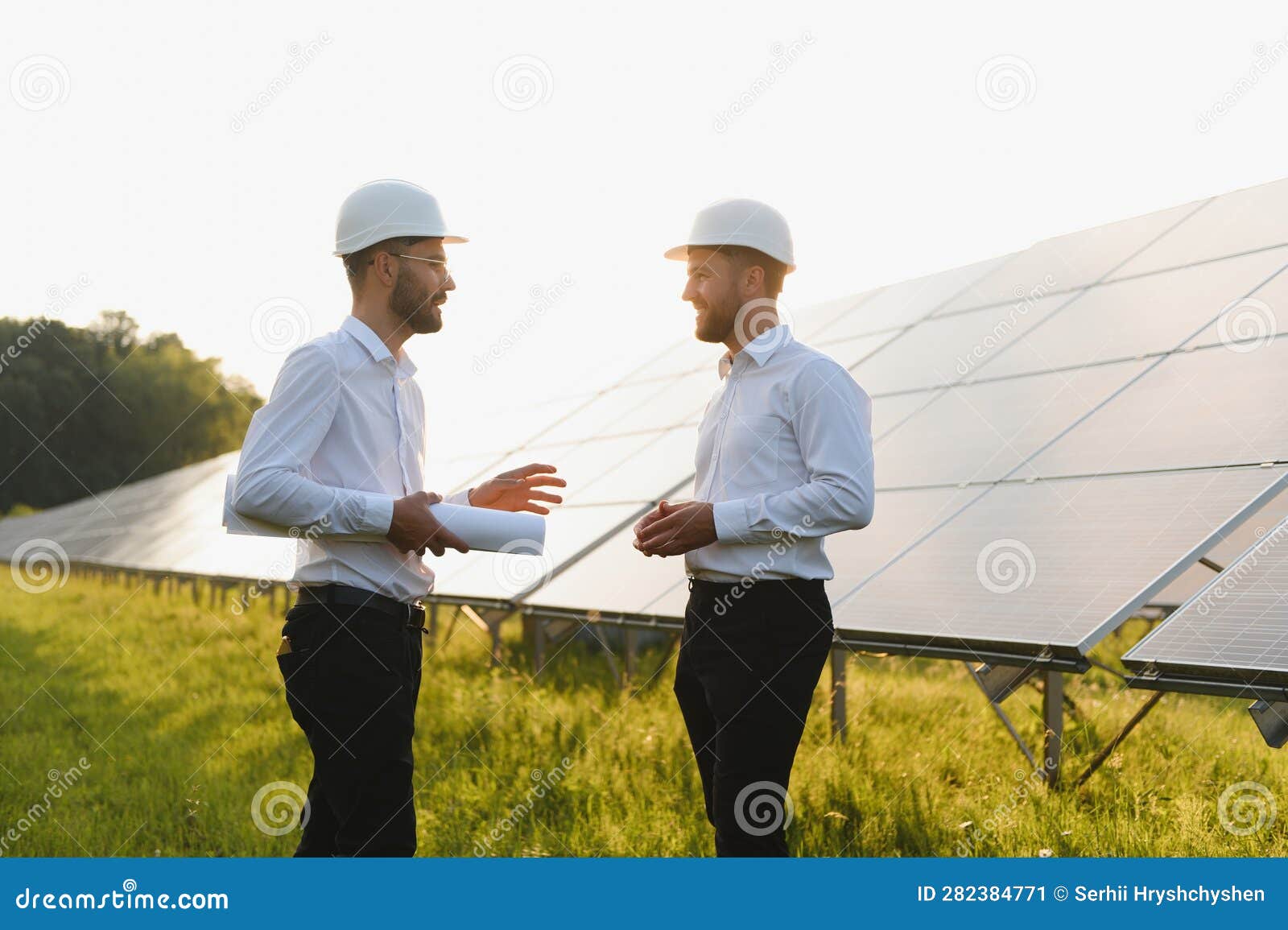 Project Manager Discuss with Worker Installation Process of Solar Panel ...