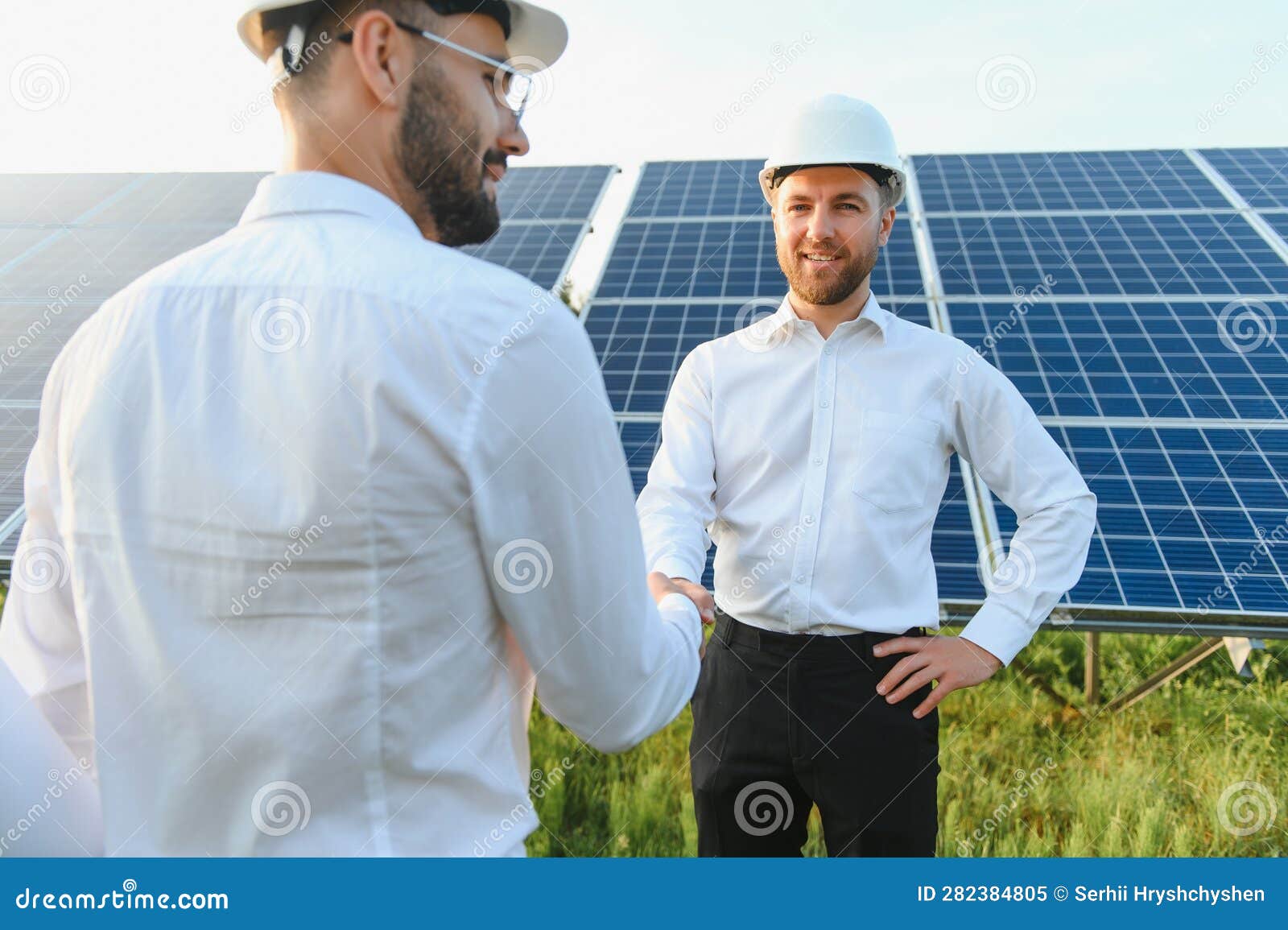 Project Manager Discuss with Worker Installation Process of Solar Panel ...