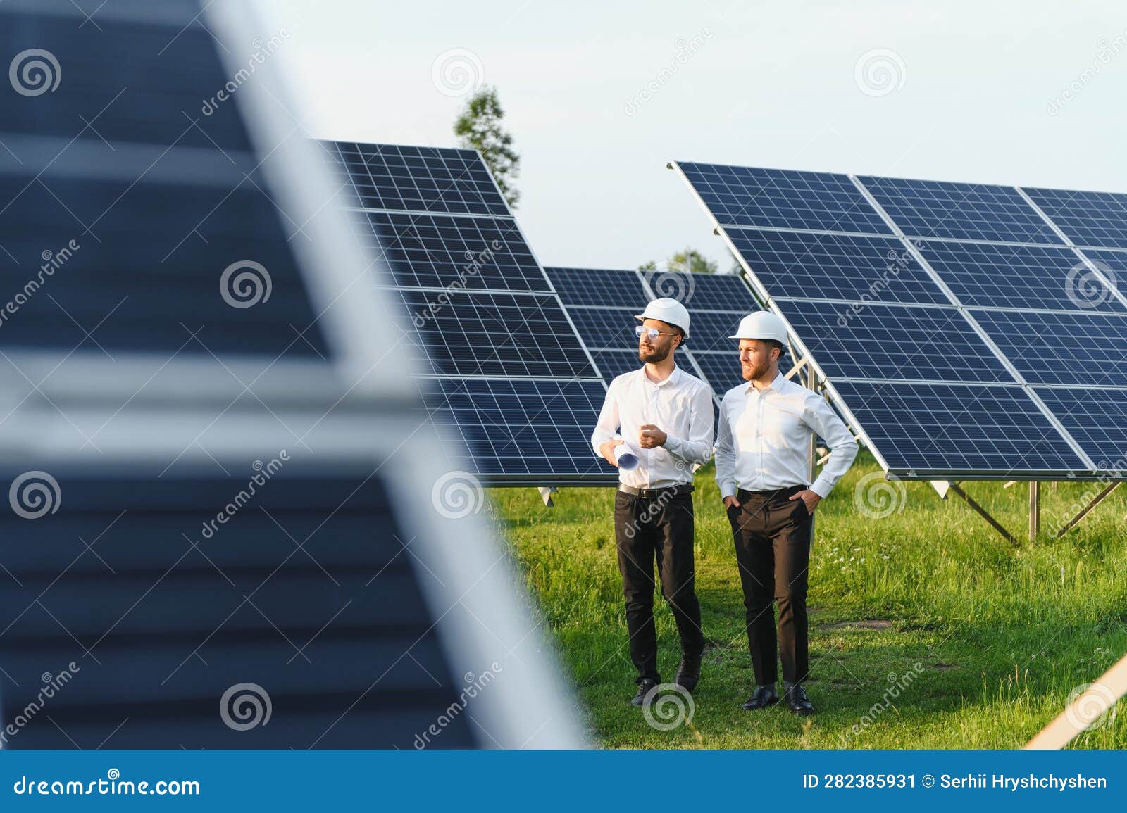 Project Manager Discuss with Worker Installation Process of Solar Panel ...