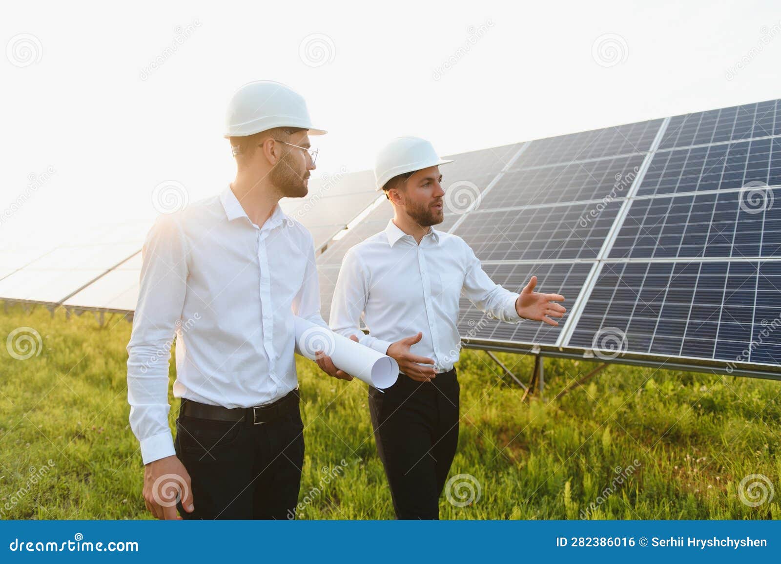 Project Manager Discuss with Worker Installation Process of Solar Panel ...