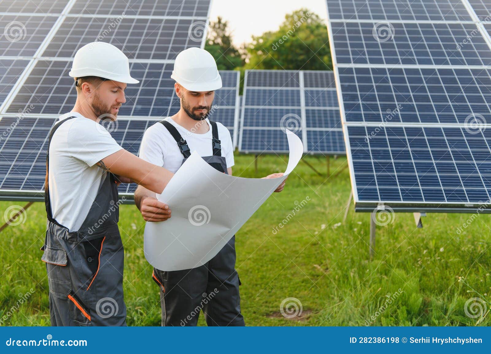 Project Manager Discuss with Worker Installation Process of Solar Panel ...