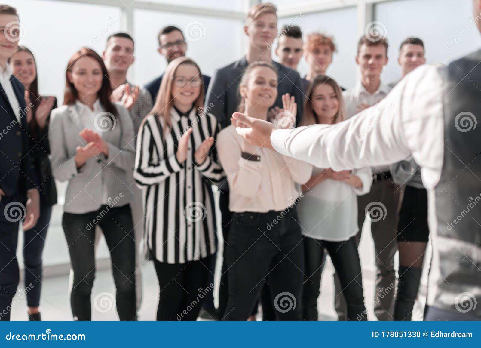 Project Manager and a Group of Young Professionals Standing in the ...