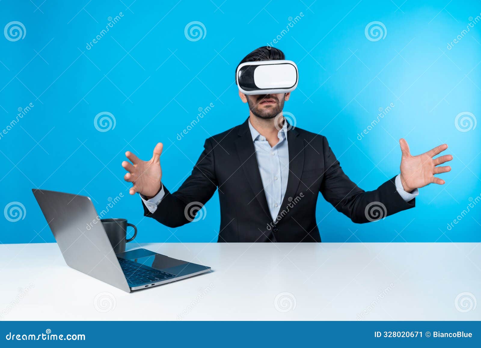 Project Manager Looking by Using VR Goggle while Sitting at Laptop ...