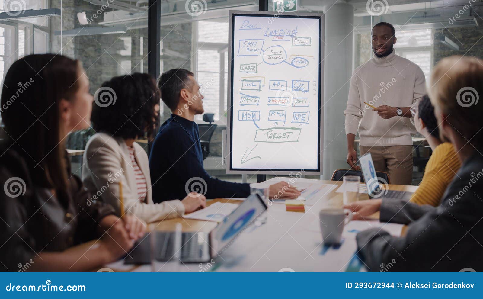 Project Manager Makes a Presentation for a Young Diverse Creative Team ...