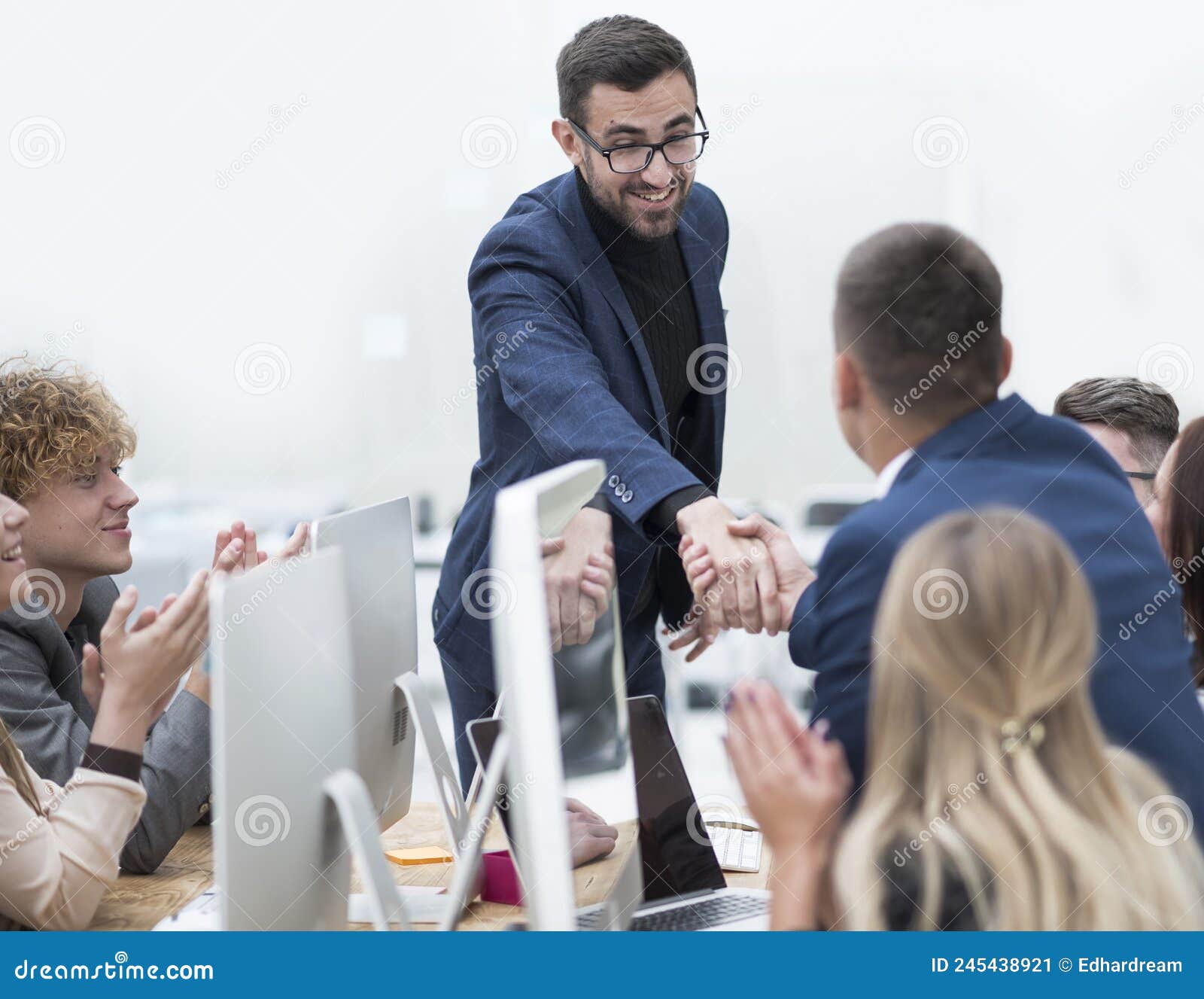 Project Manager Shaking Hands with the Best Employee Stock Image ...