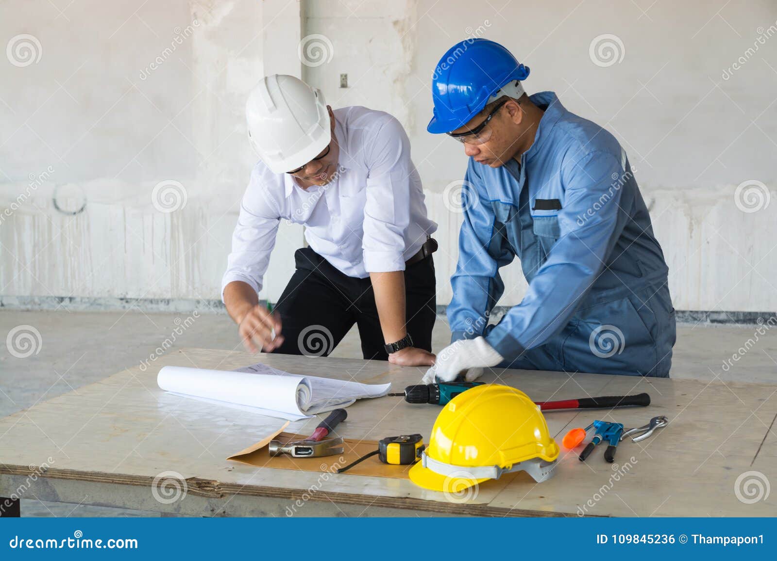 Supervisor Foreman or Architect Discuss with Technical Engineer Stock ...