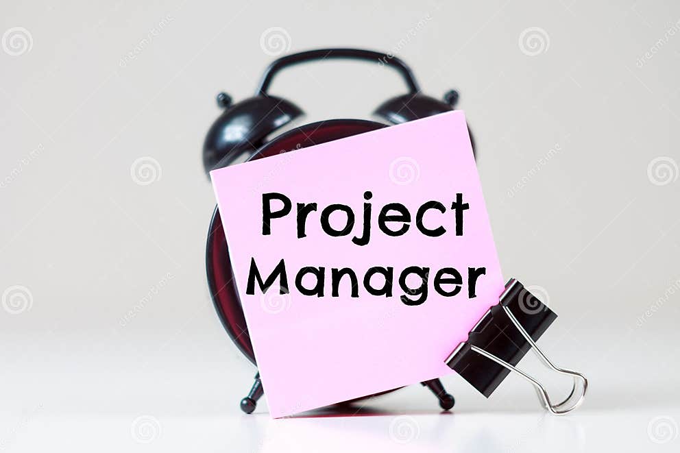 Project Manager Text on a Sticker for Reminders with an Alarm Clock ...