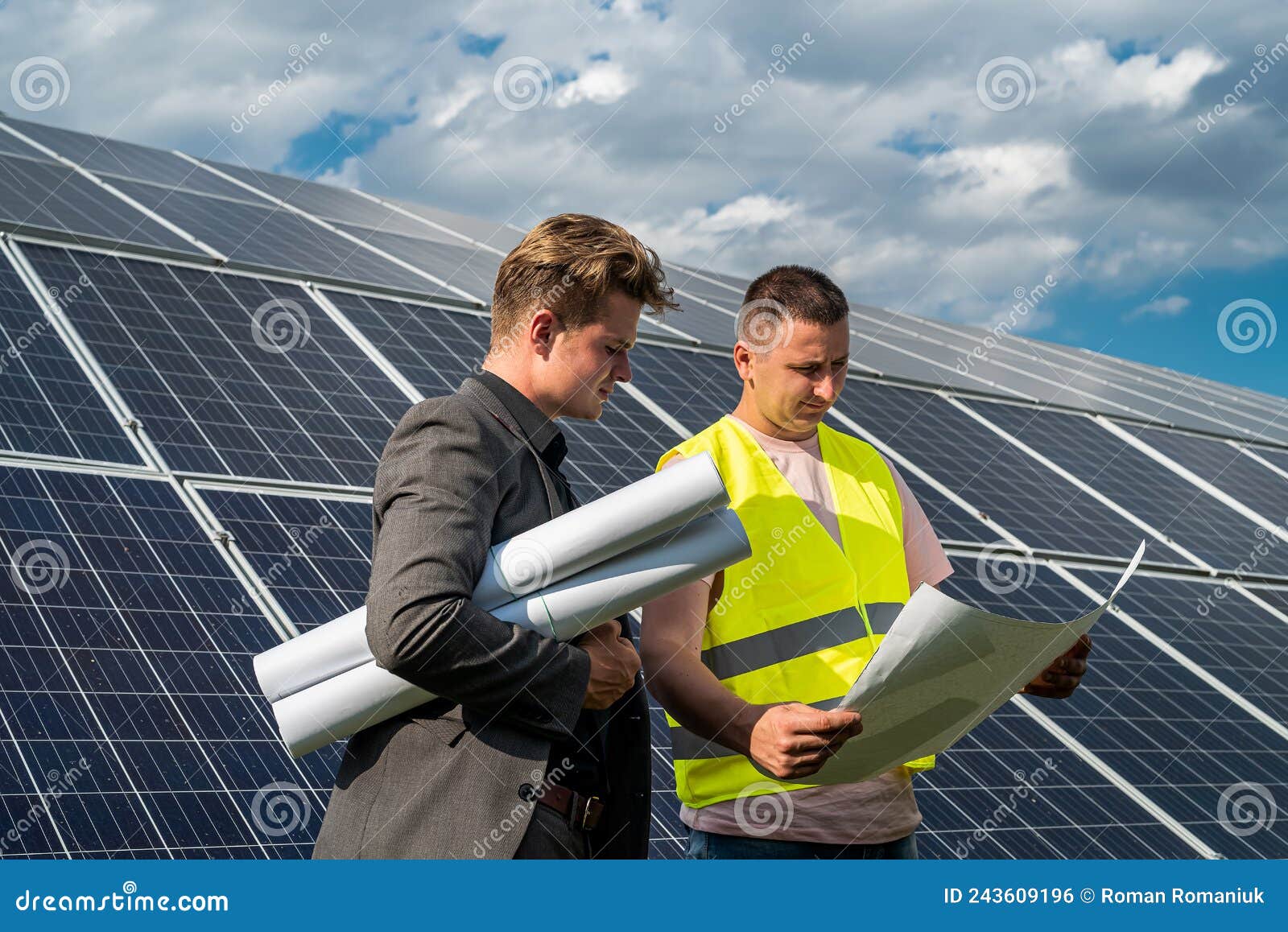 Project Manager and Worker Discussing New Solar Panels Installation ...
