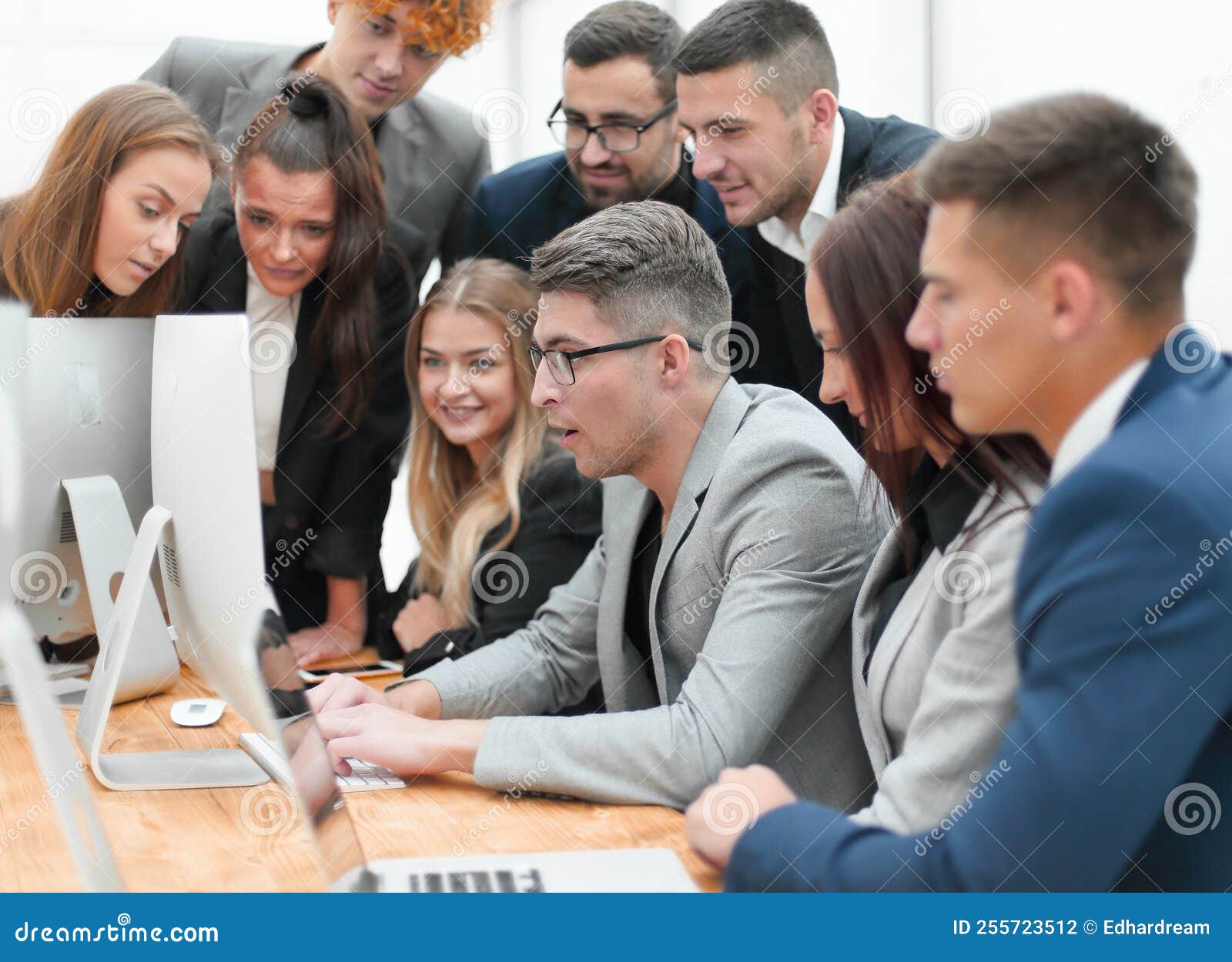 Project Manager and the Working Group Looking at the Computer Screen ...