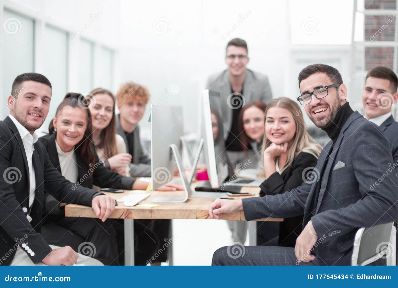 Project Manager and Working Group Sitting at a Table in the Conference ...