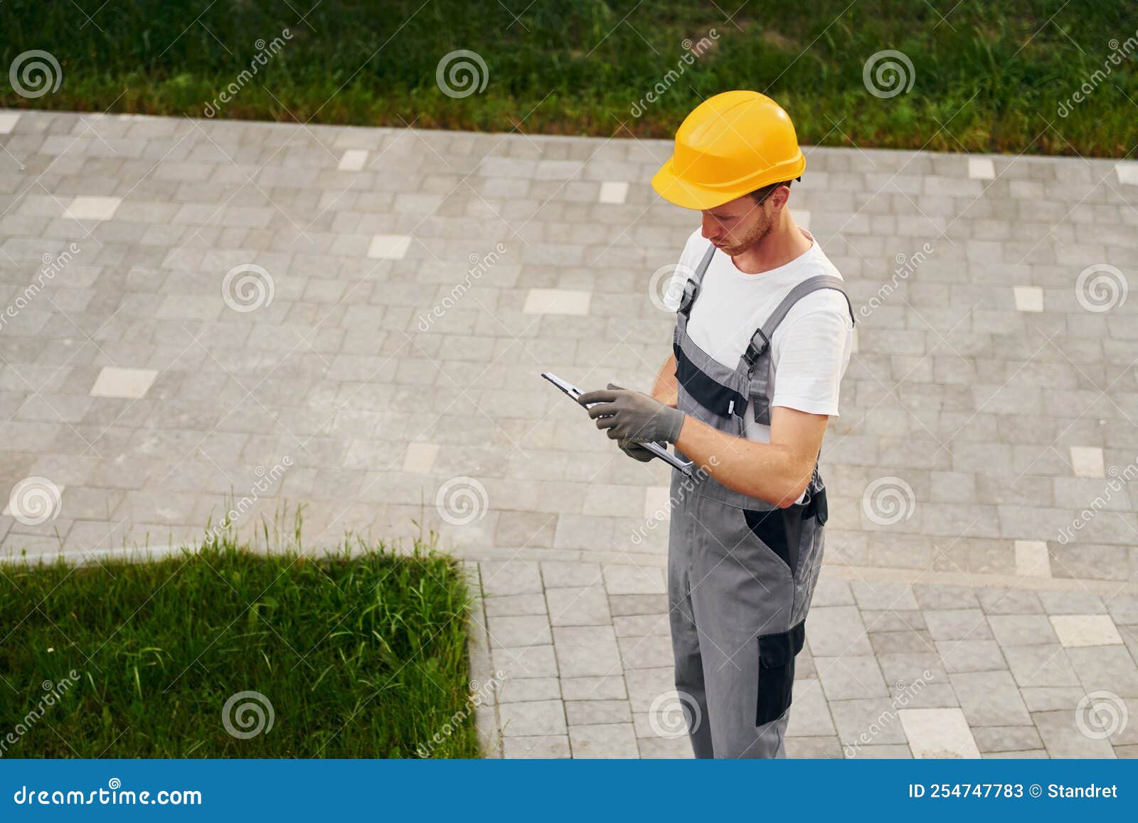 Project Manager. Young Man Working in Uniform at Construction at ...