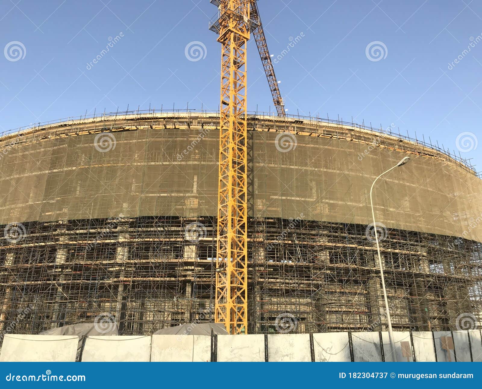 Project Site Construction Under Progress Using Tower Crane and ...