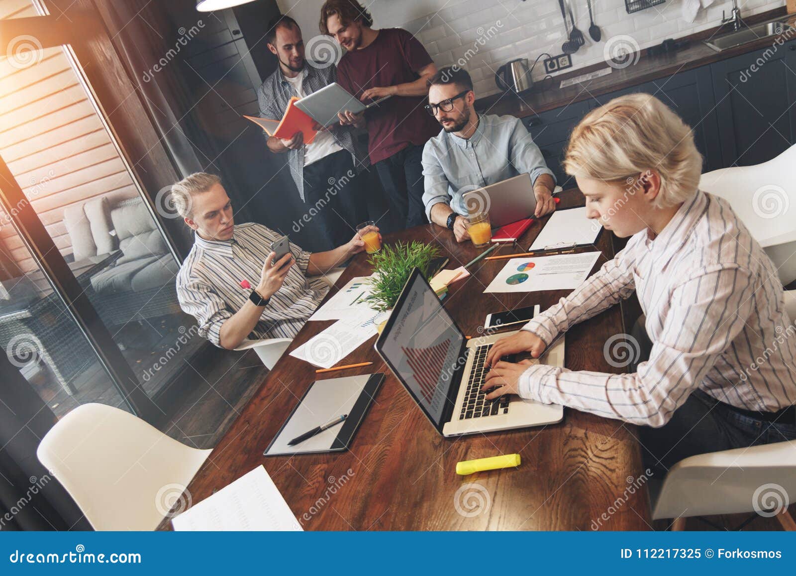 Project Team Working Together in Kitchen Room. Teamwork at Home Stock ...