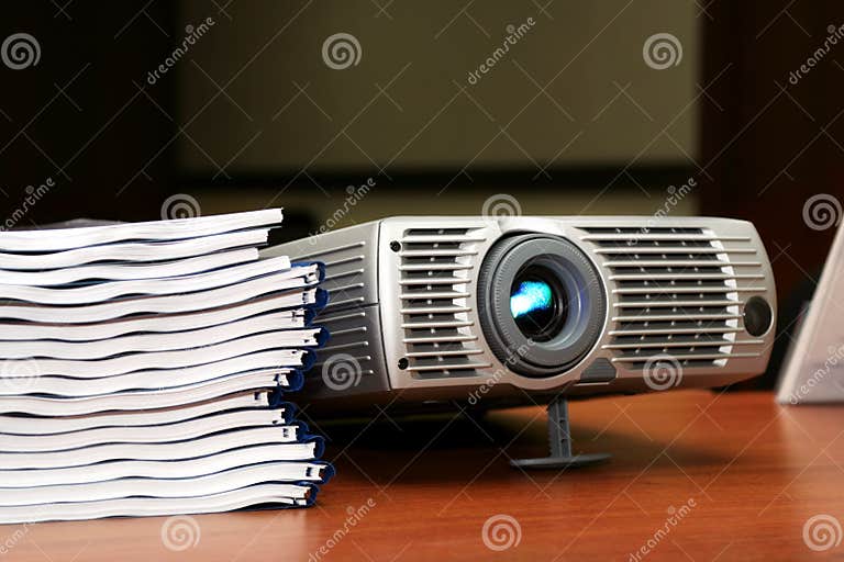 Projector with Pile of Books Stock Photo - Image of indoors, equipment ...