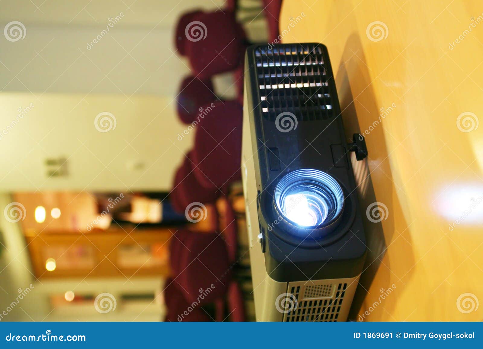Projector on Table with Chairs and Door Behind (vertical) Stock Image ...